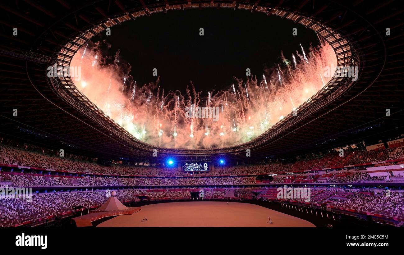 Fireworks explode during the opening ceremony in the Olympic Stadium at ...