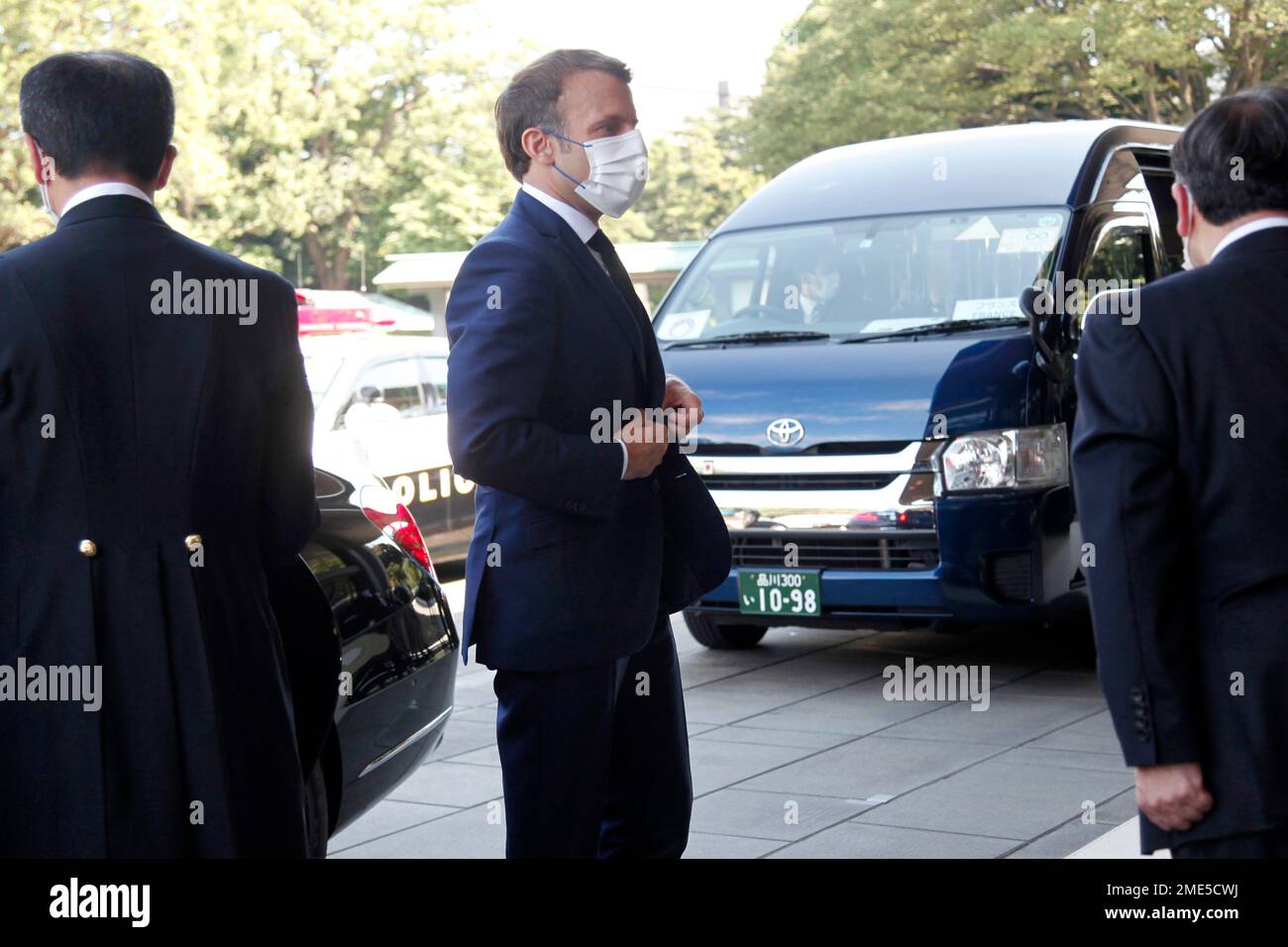 French President Emmanuel Macron arrives at Imperial Palace to meet ...