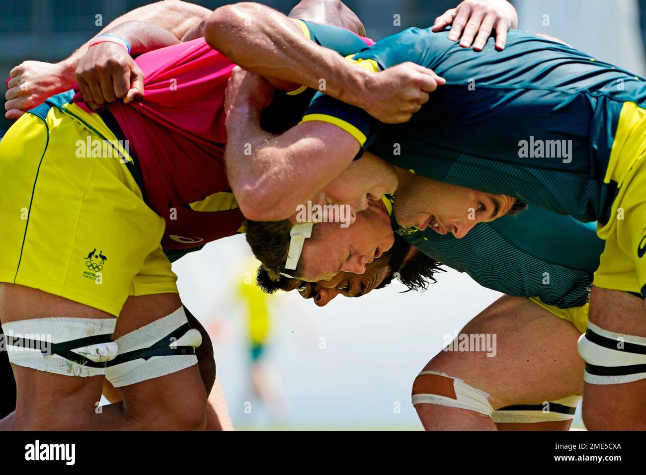 Members of Australia's men's rugby sevens team pack down for a scrum ...