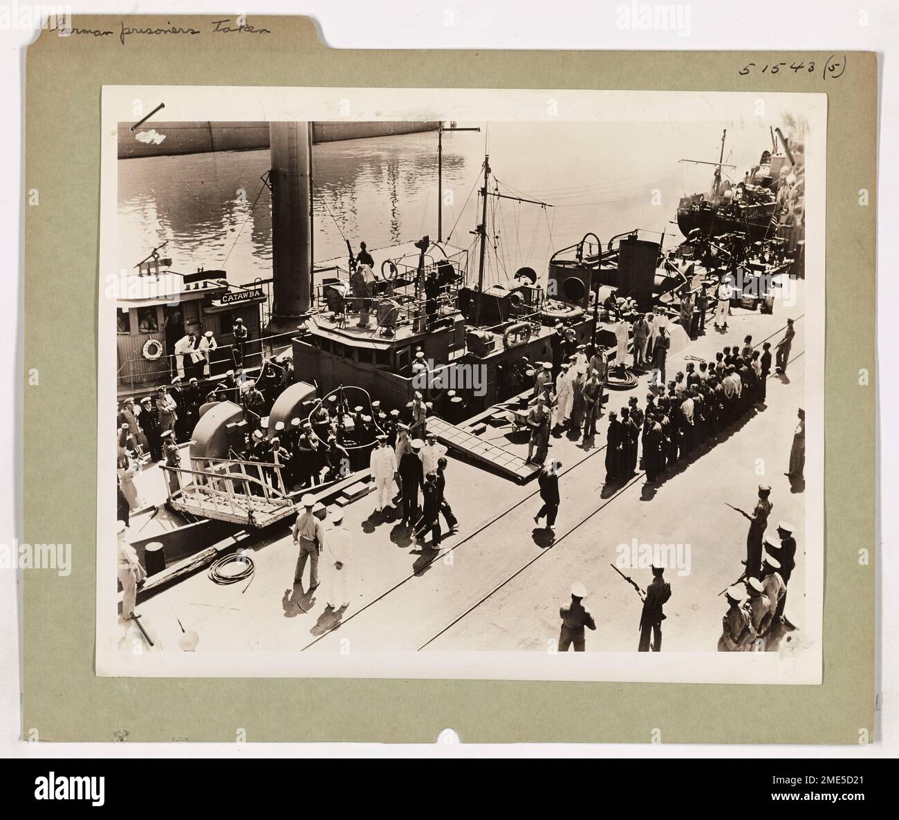 Survivors from a German submarine are taken prisoner by the U.S. Coast ...