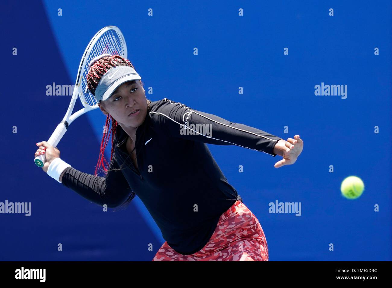 Naomi Osaka, of Japan, practices for the women's tennis competition ...