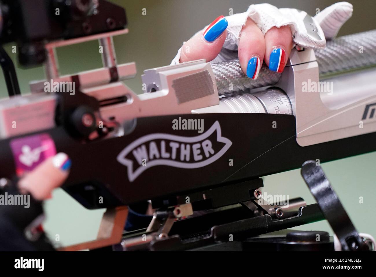 Alison Marie Weisz, of the United States, wears red, white, and blue ...