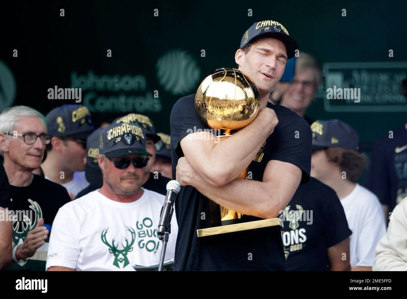 Milwaukee Bucks' Brook Lopez hugs the NBA Championship trophy during a ...