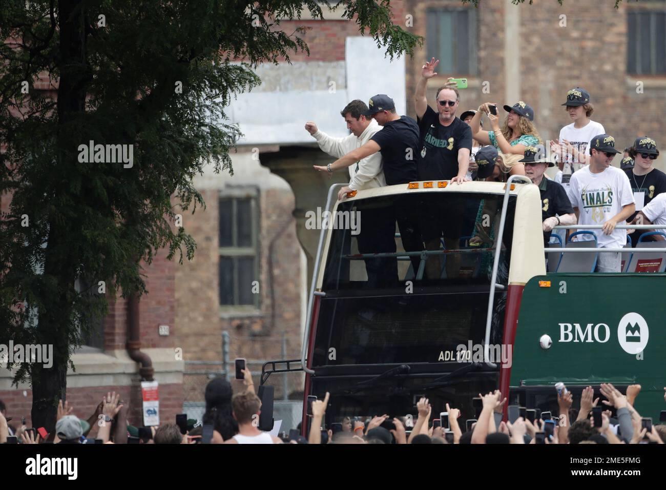 Milwaukee Bucks head coach Mike Budenholzer gestures to the crowd ...