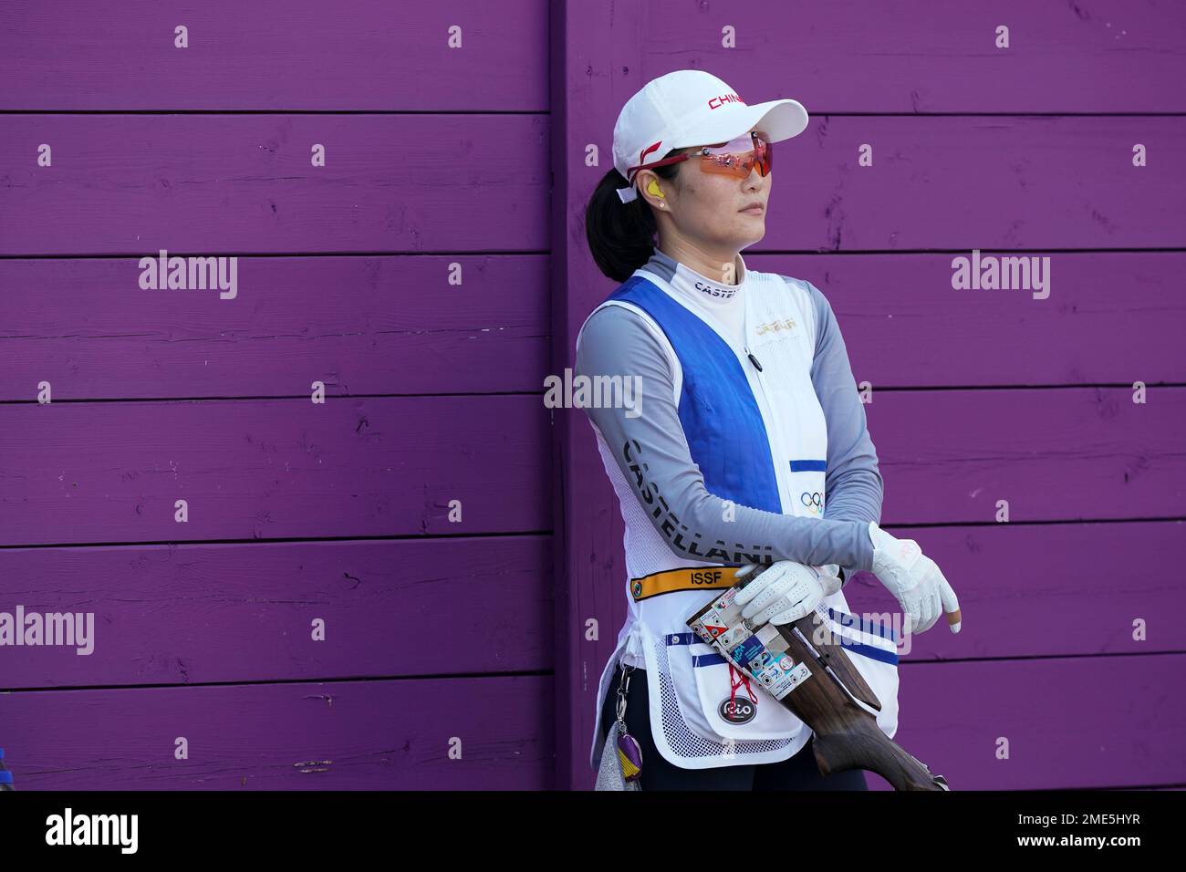 Meng Wei, of China, stands during practice at the Asaka Shooting Range ...