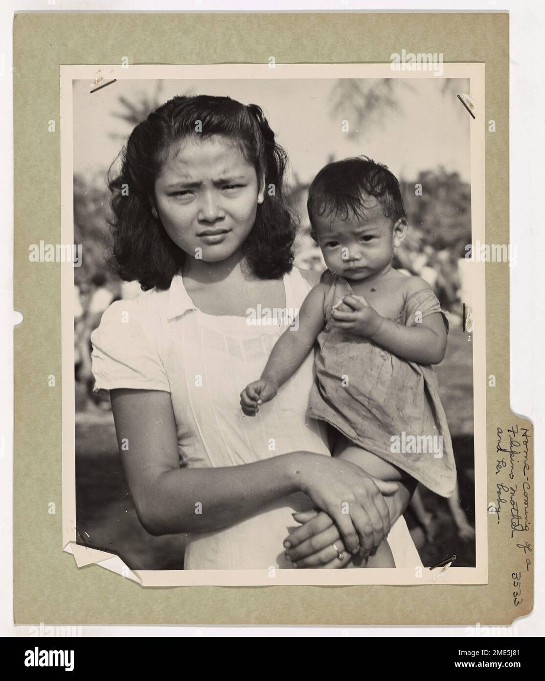 A Filipino mother and her baby are captured by a Coast Guard ...