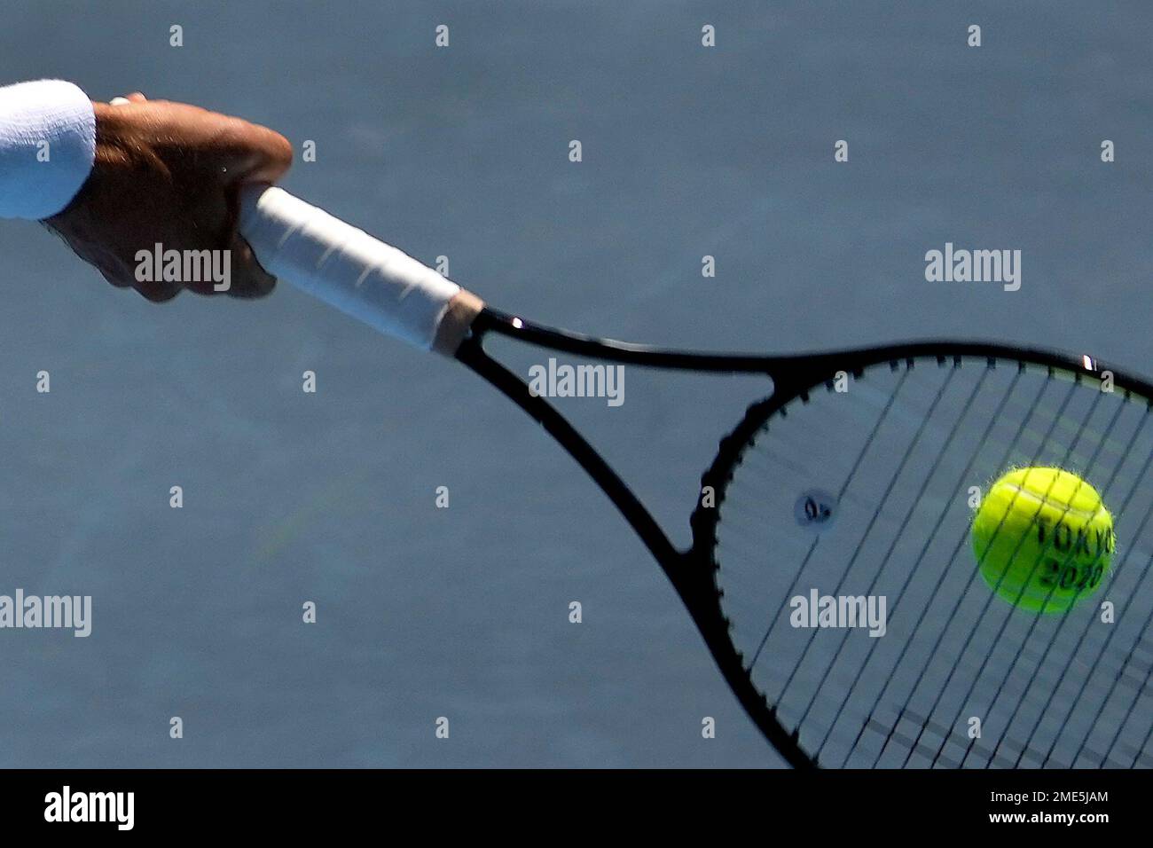 Novak Djokovic, of Serbia, practices for the men's tennis competition ...