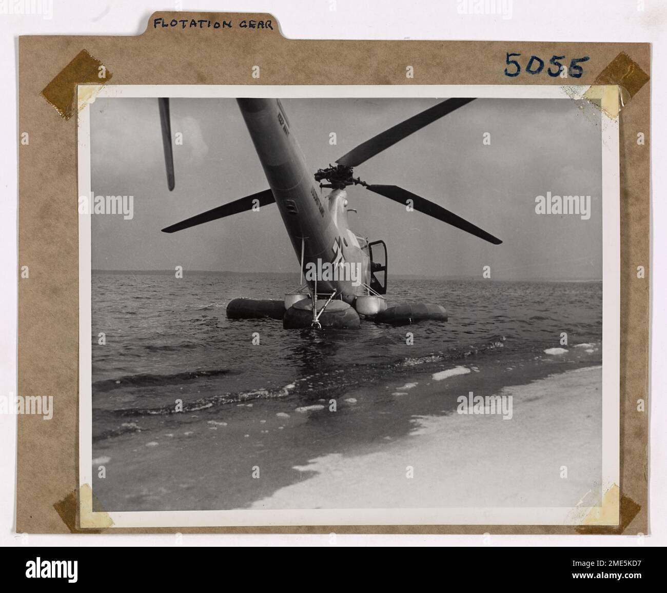 This test shows a U.S. Coast Guard helicopter landing on water ...