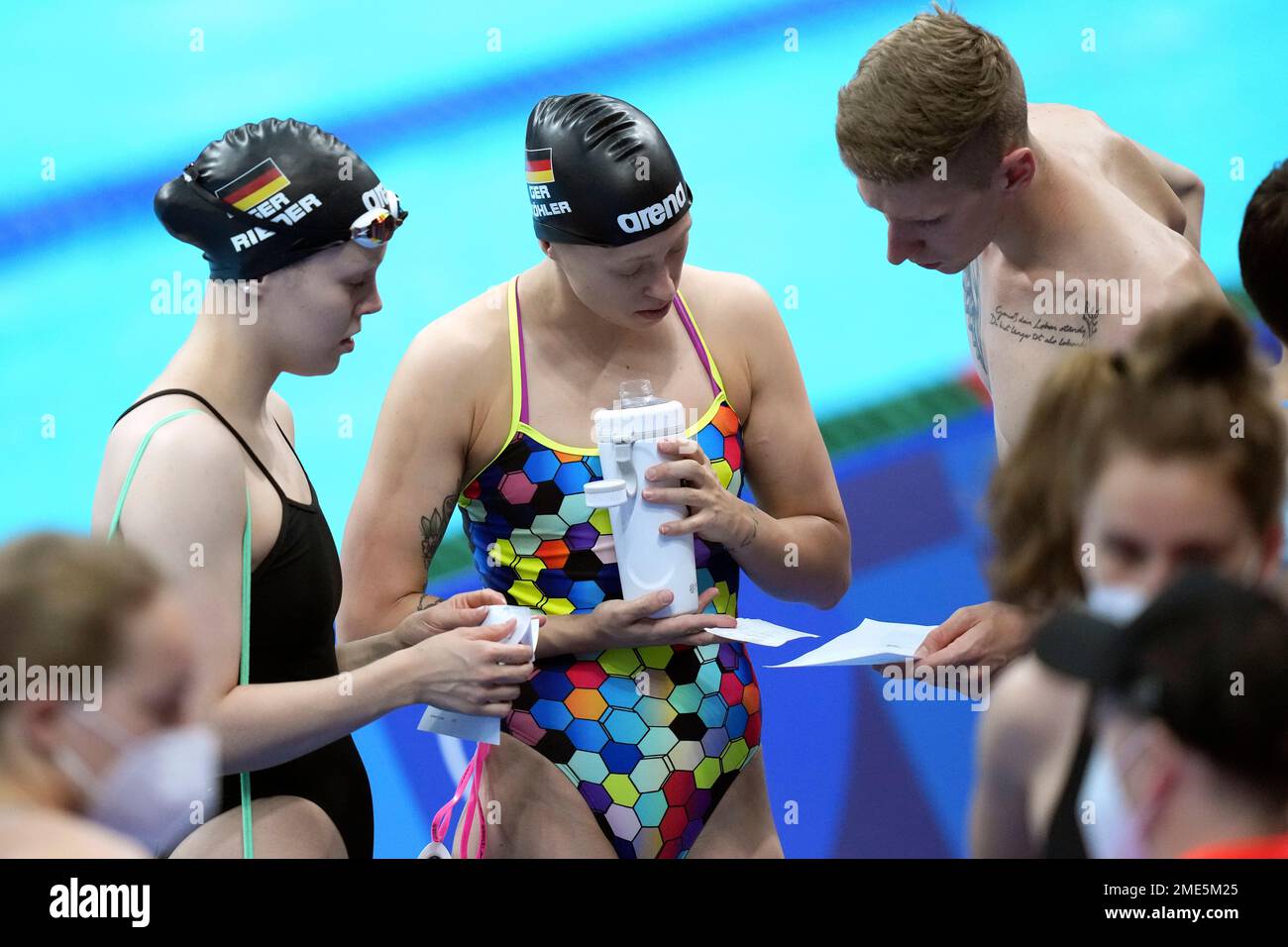 Florian Wellbrock, center, Celine Rieder, left, and Sara Koehler of ...