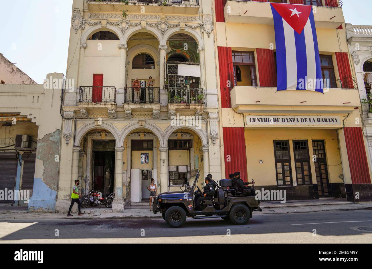 Special forces police patrol the streets as they drive past a large ...