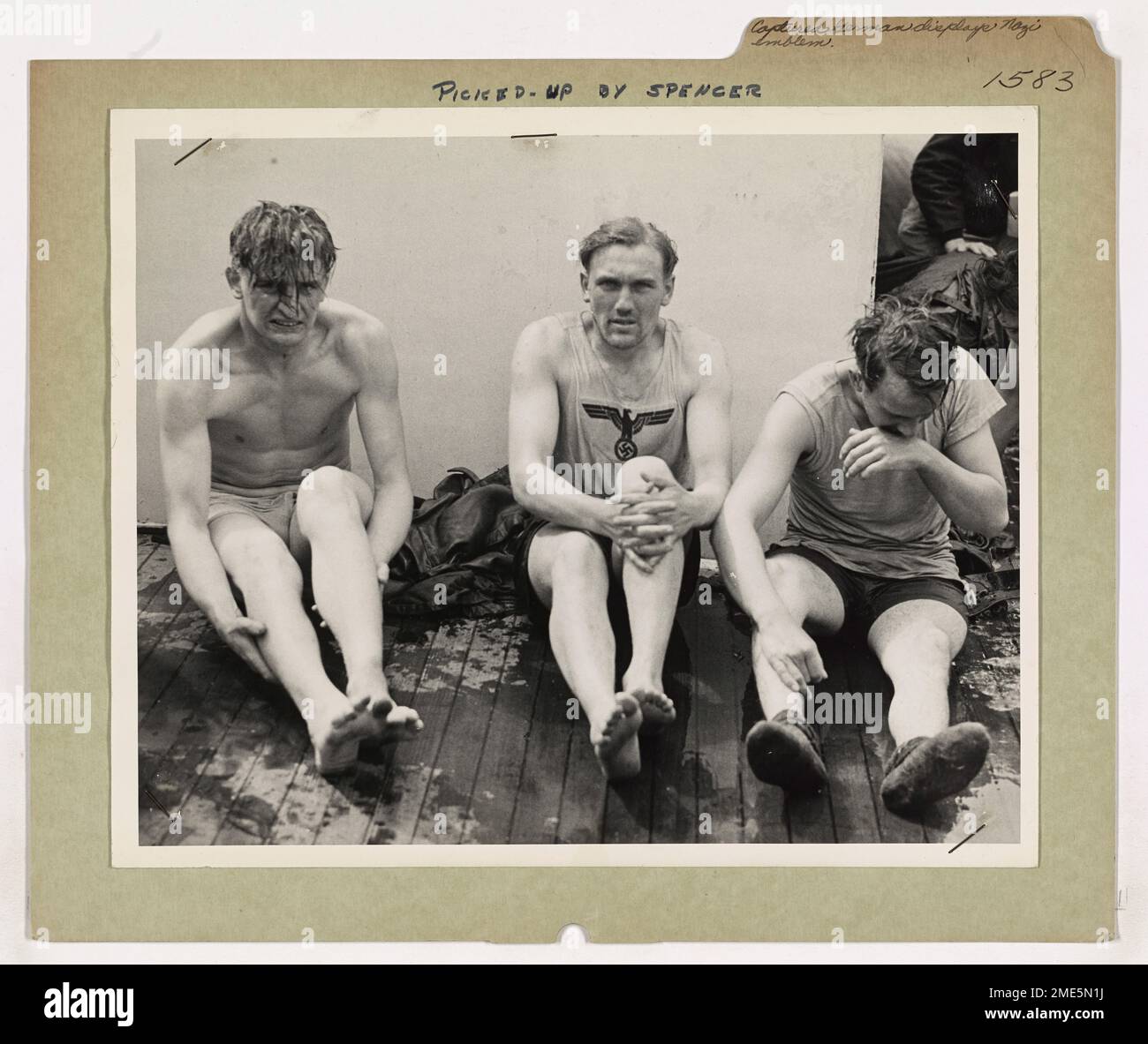 Captured German Displays Nazi Emblem. This image depicts captured ...