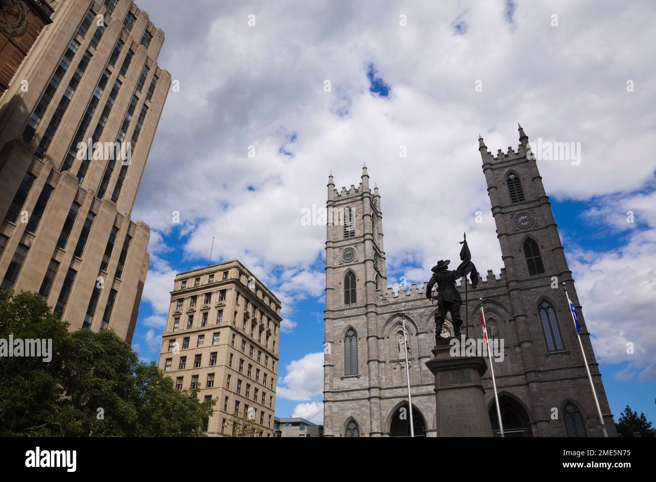 Old Architectural buildings and De Maisonneuve Monument facing Notre ...