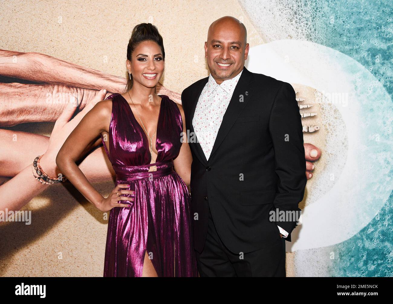 Dr. Mena Rajan, left, and Ashwin Rajan attend the world premiere of ...