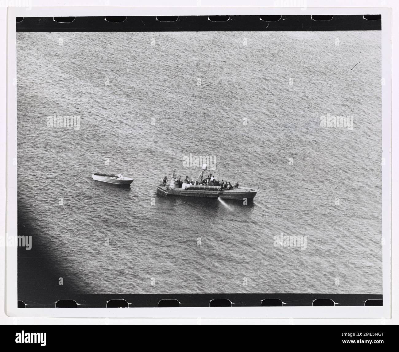 On August 13, 1963, a U.S. Coast Guard patrol plane captures an image ...