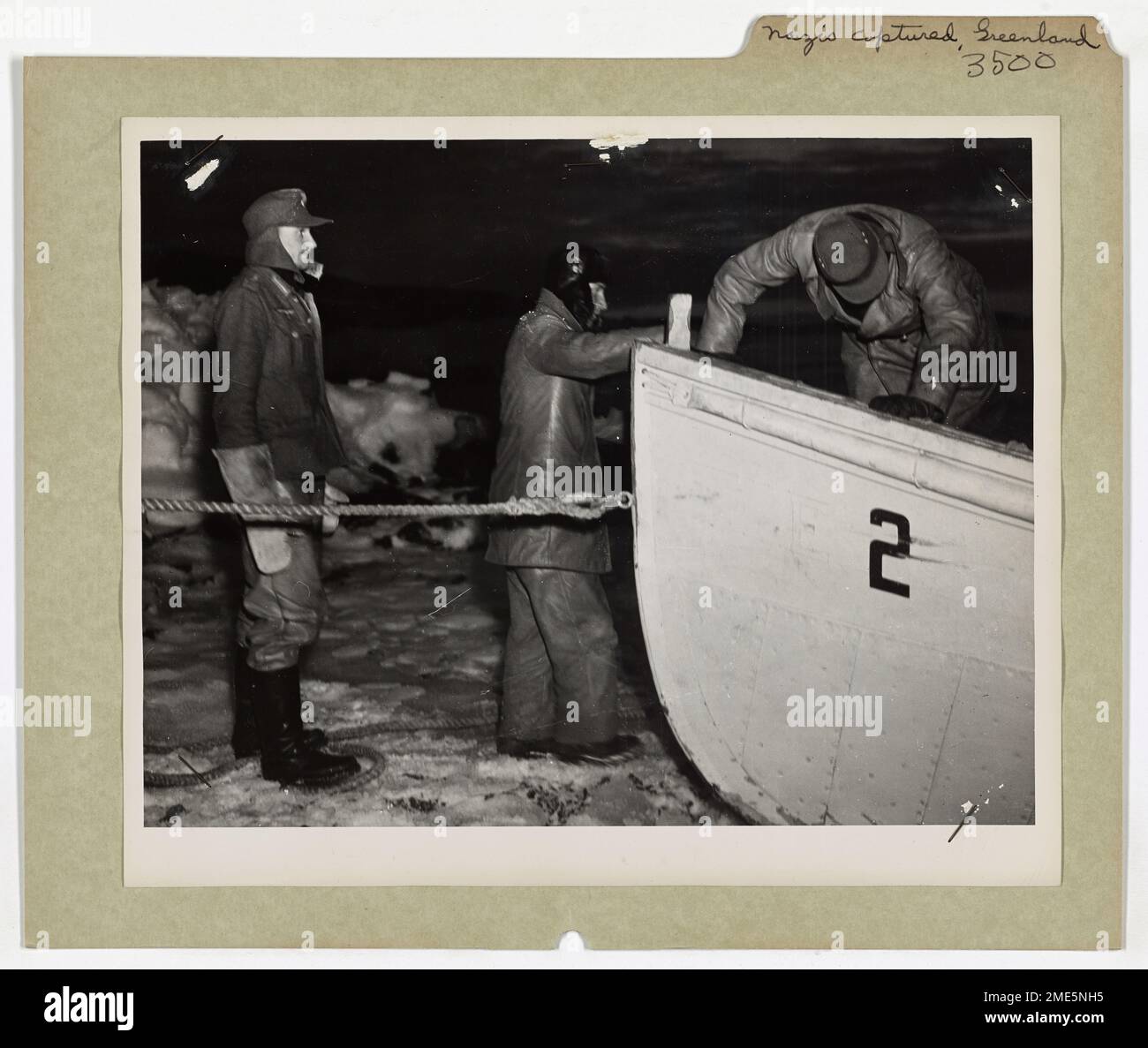 Twelve captured Nazi soldiers are shown after a surprise raid by Coast ...