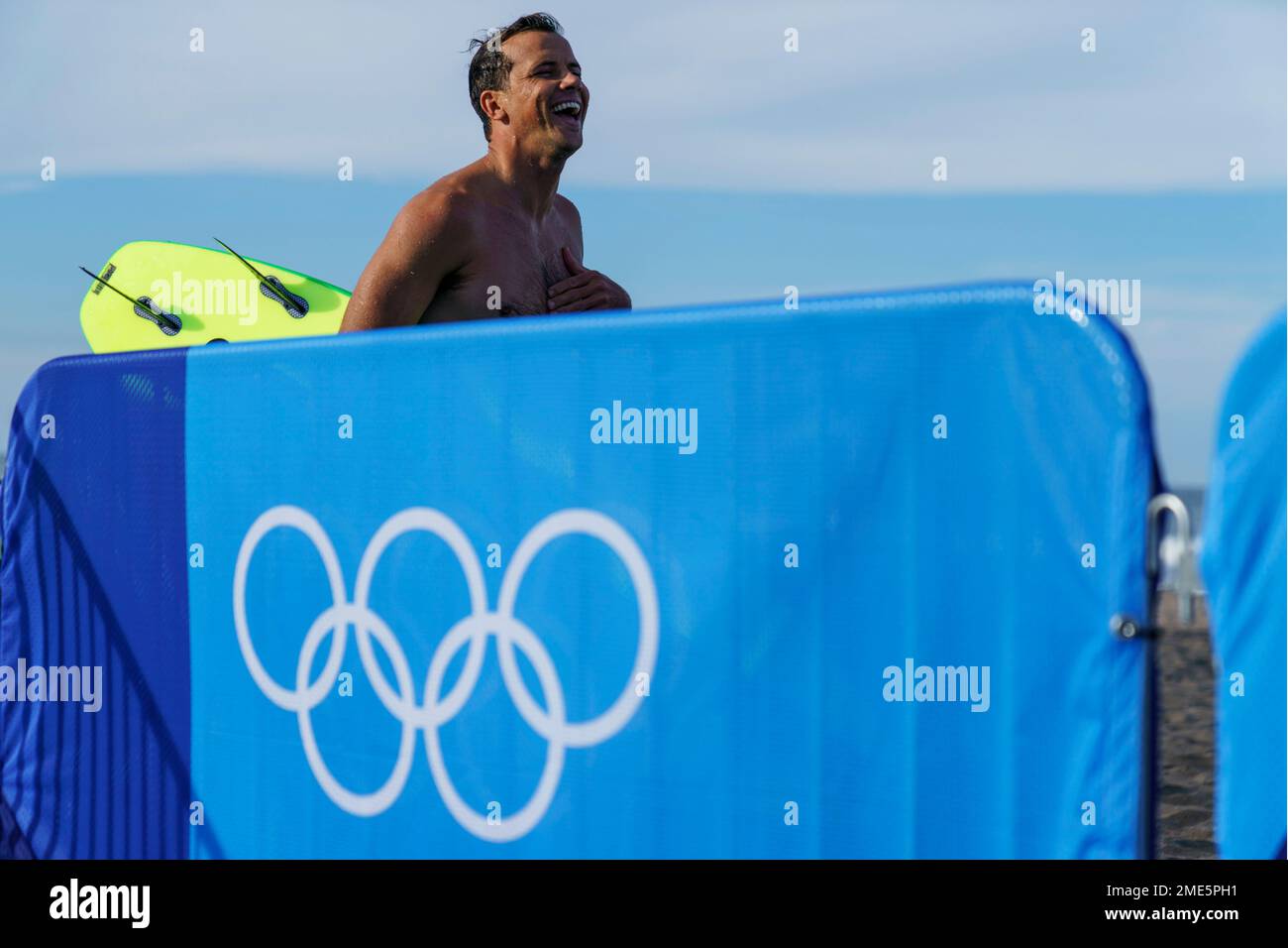 Surfer Julian Wilson, of Australia, comes out of the water after a ...