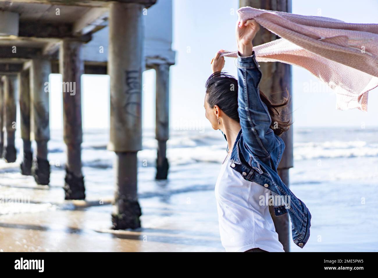 Side view person walking waving hi-res stock photography and images - Alamy