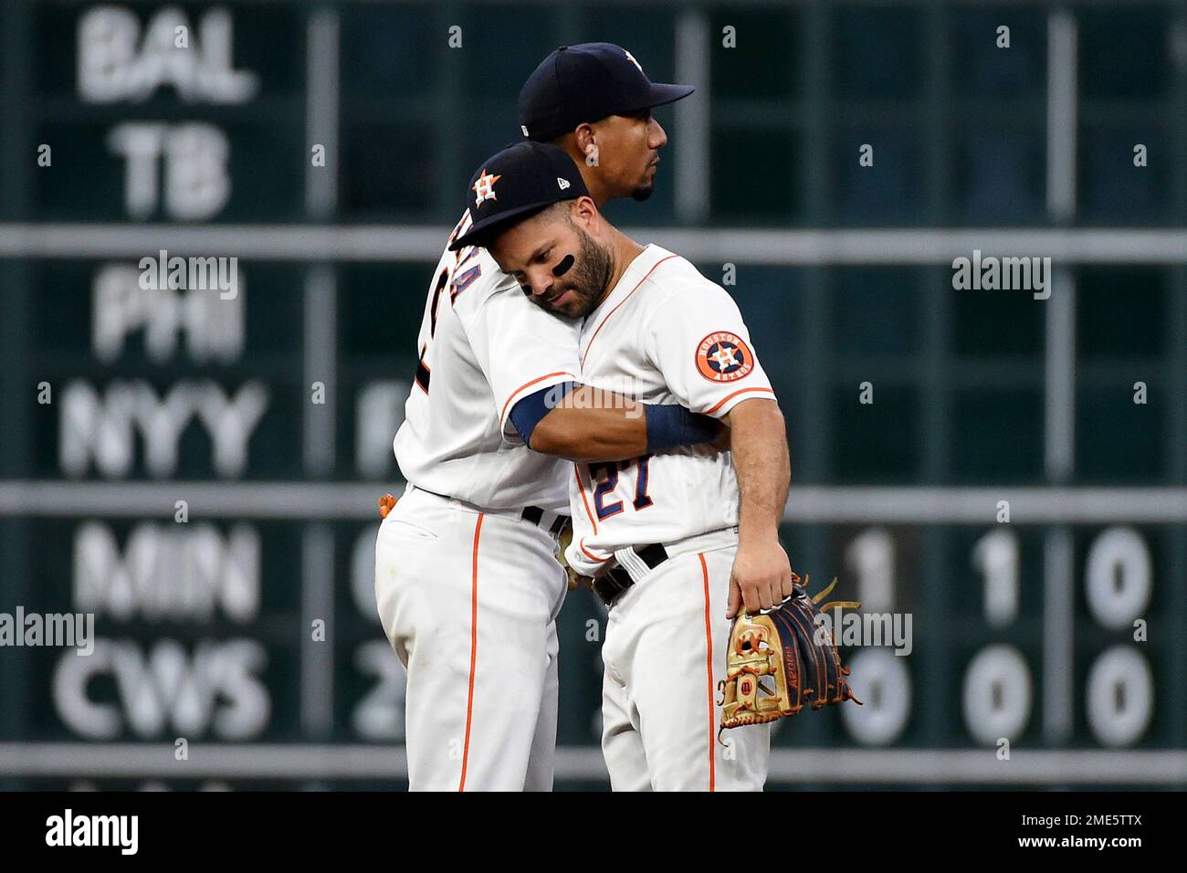 Houston Astros' Jose Altuve, right, and Robel Garcia celebrate the team ...