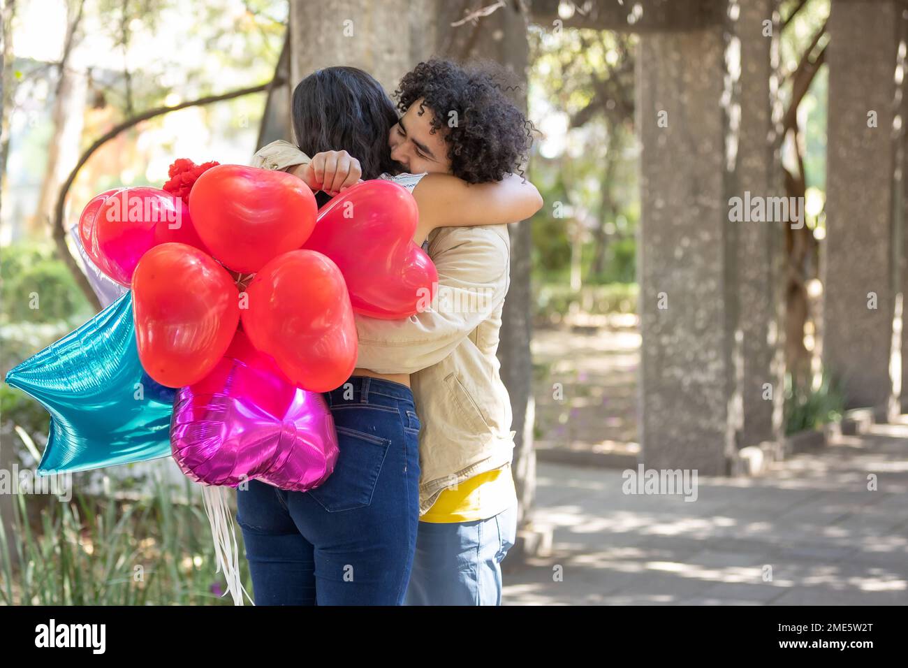 mexican young couple hugging on valentine's day, february 14th Stock ...