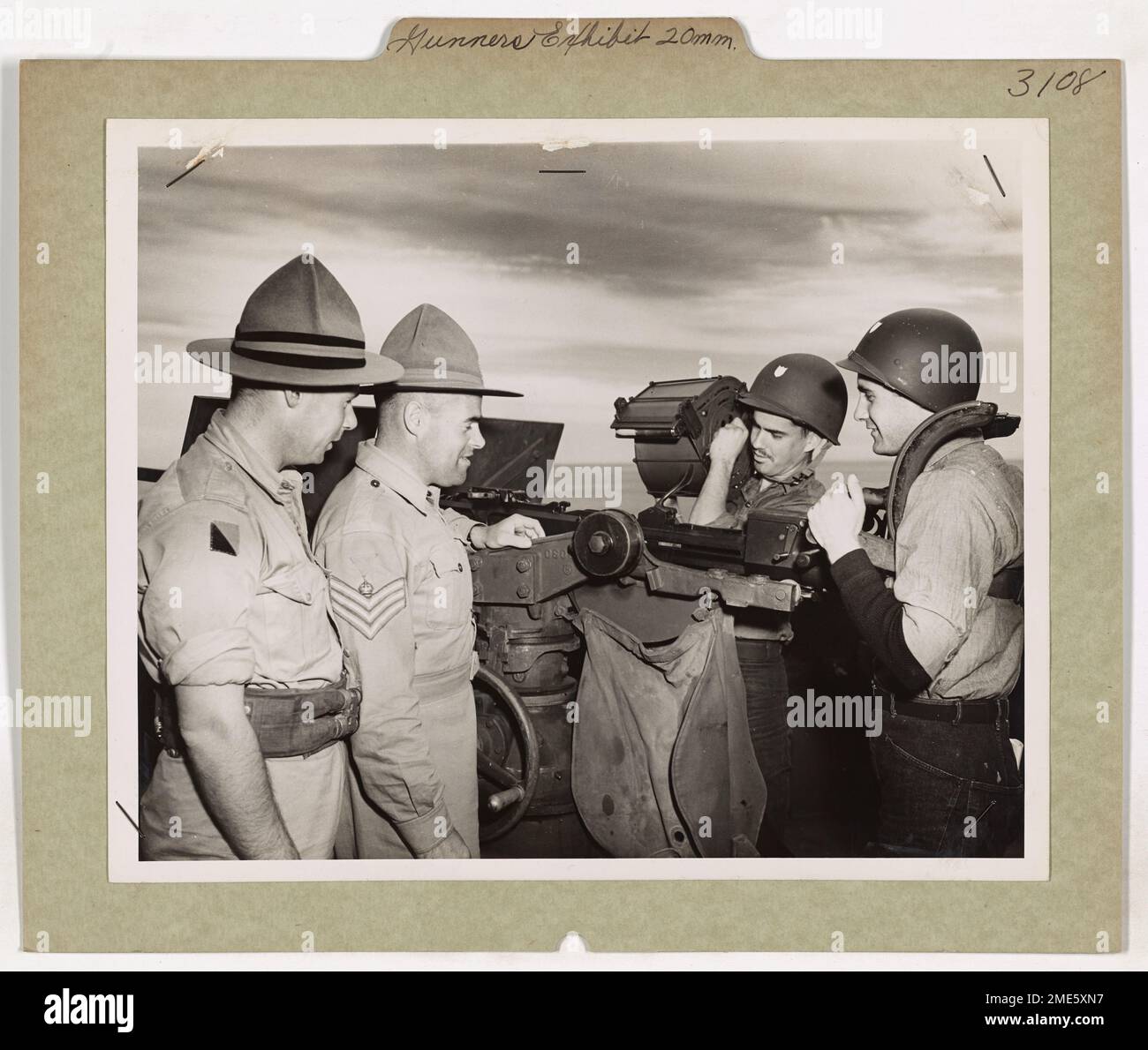 This image captures Coast Guard gunners Charles W. Callow and Richard ...