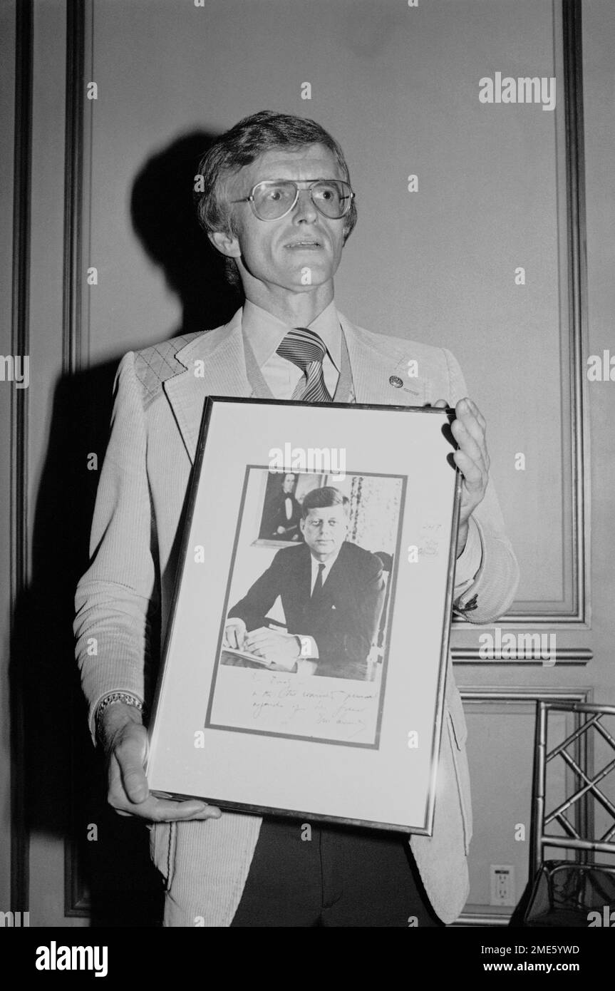 Jim Rissmiller, head of Wolf and Rissmiller concert promoters, holds ...