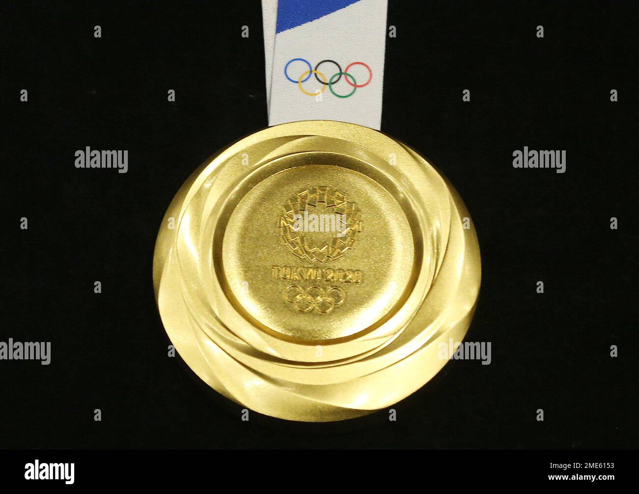 FILE - In this July 24, 2019, file photo, Tokyo 2020 Olympic gold medal ...