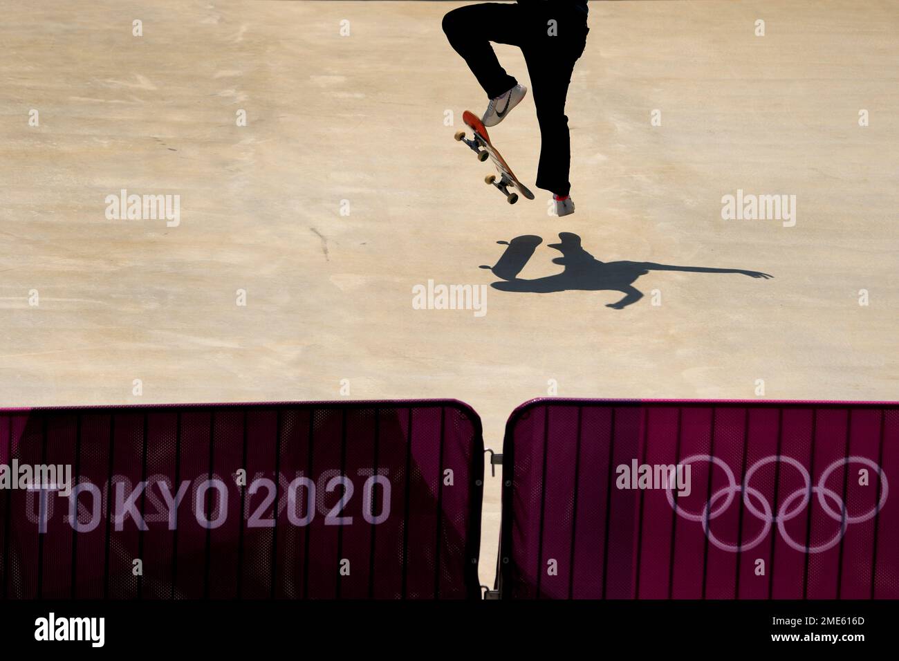 An athlete from Australia practices for the skateboarding competition ...