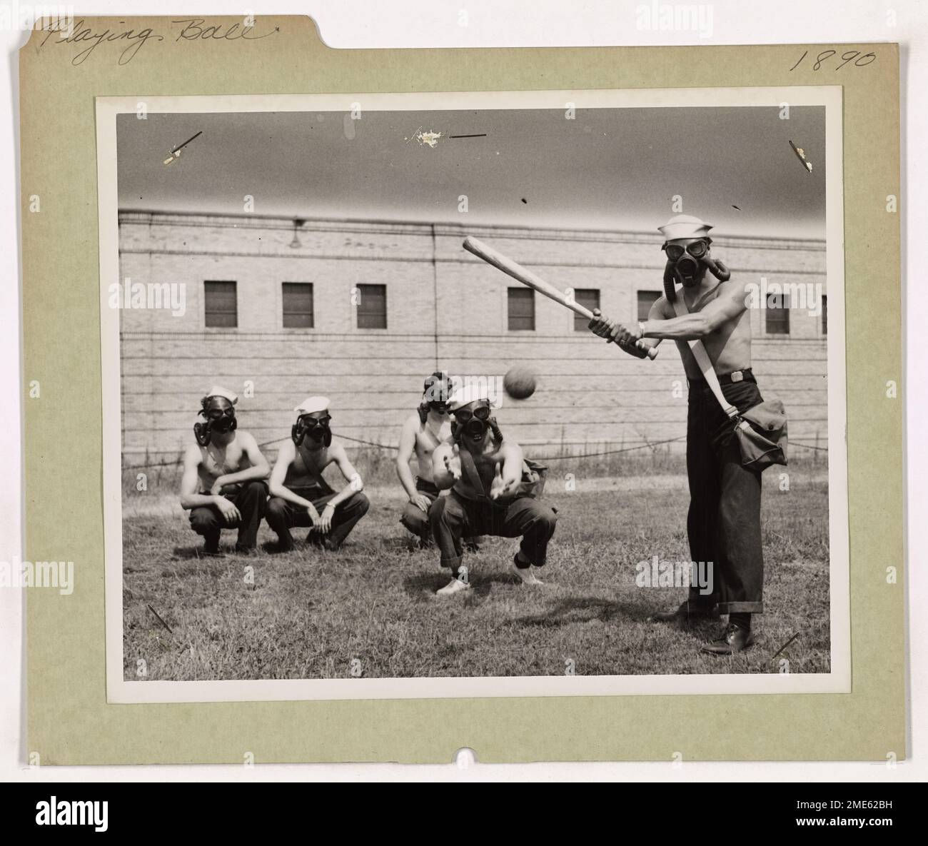 Coast Guardsmen engage in recreational activities, playing ball while ...