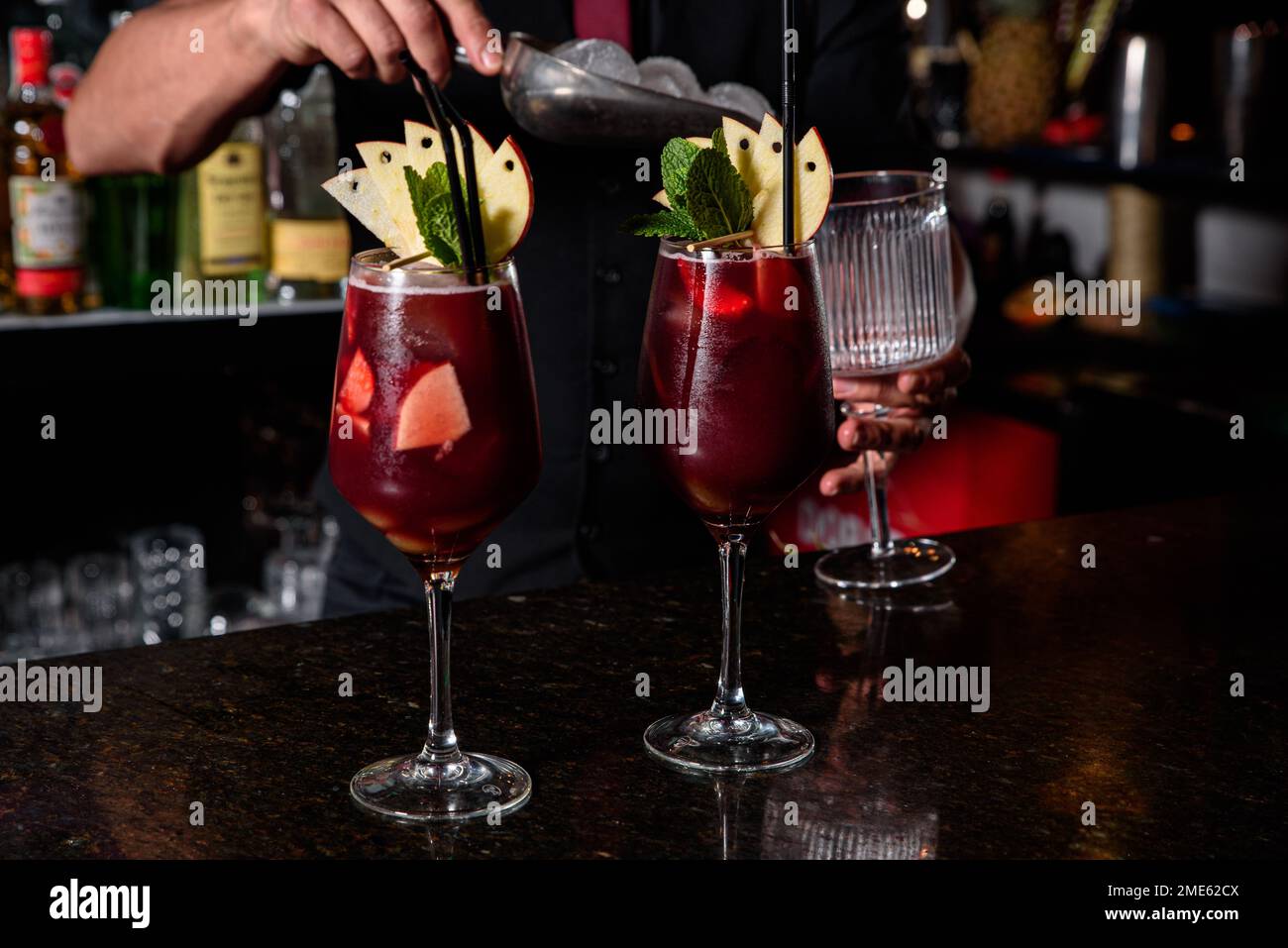 professional bartender preparing cocktails at the bar Stock Photo - Alamy