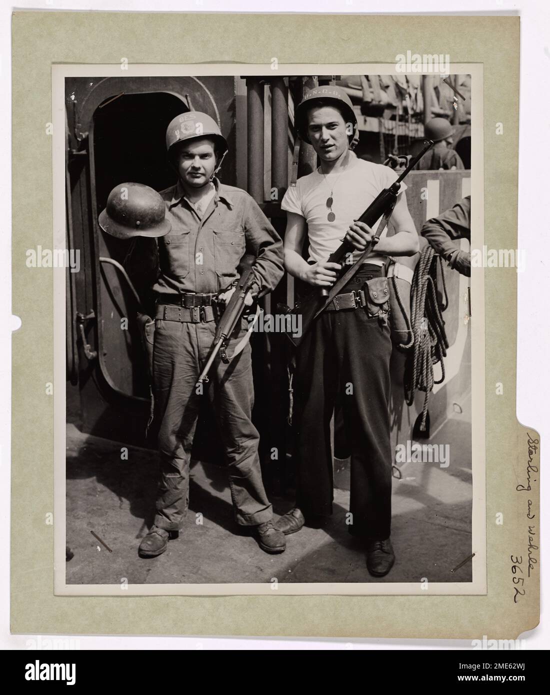 Coast Guard combat photographers Bryce E. Starling and Charles J ...
