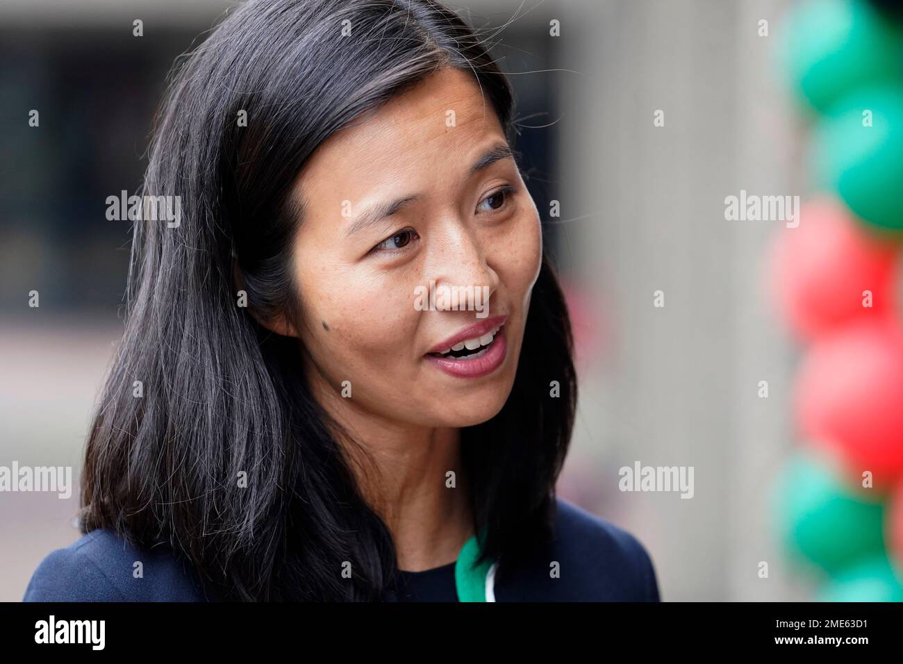 Boston mayoral candidate Michelle Wu speaks with a reporter before ...
