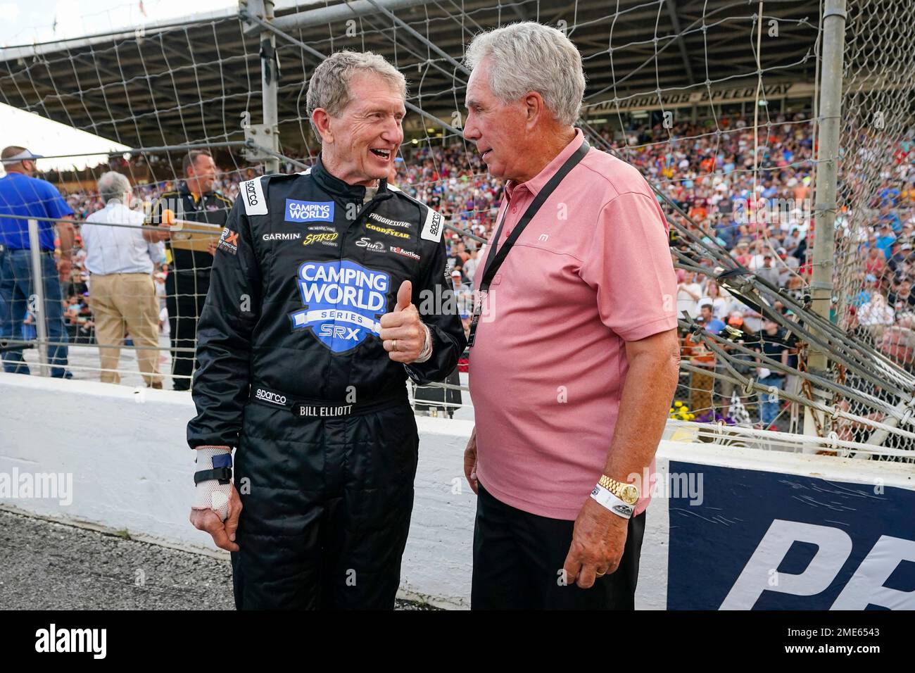 Bill Elliott, left, and Darrell Waltrip talk before an SRX Series auto race Saturday, July 17 ...