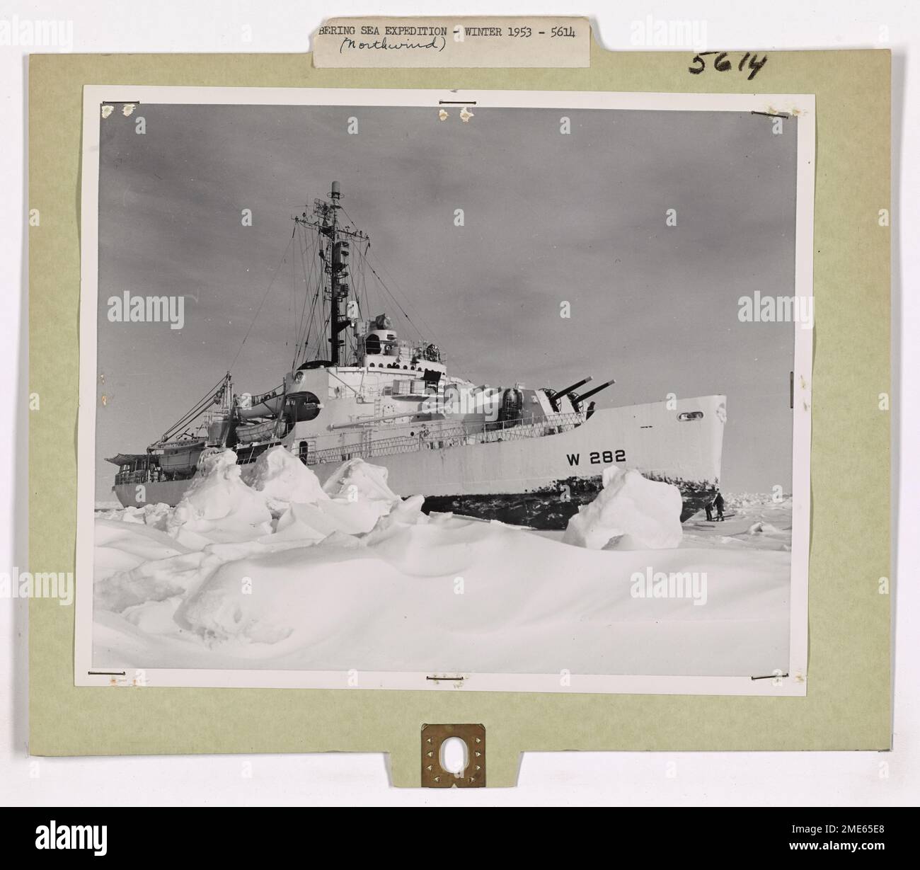 The Coast Guard icebreaker NORTHWIND rests frozen in the ice of the ...