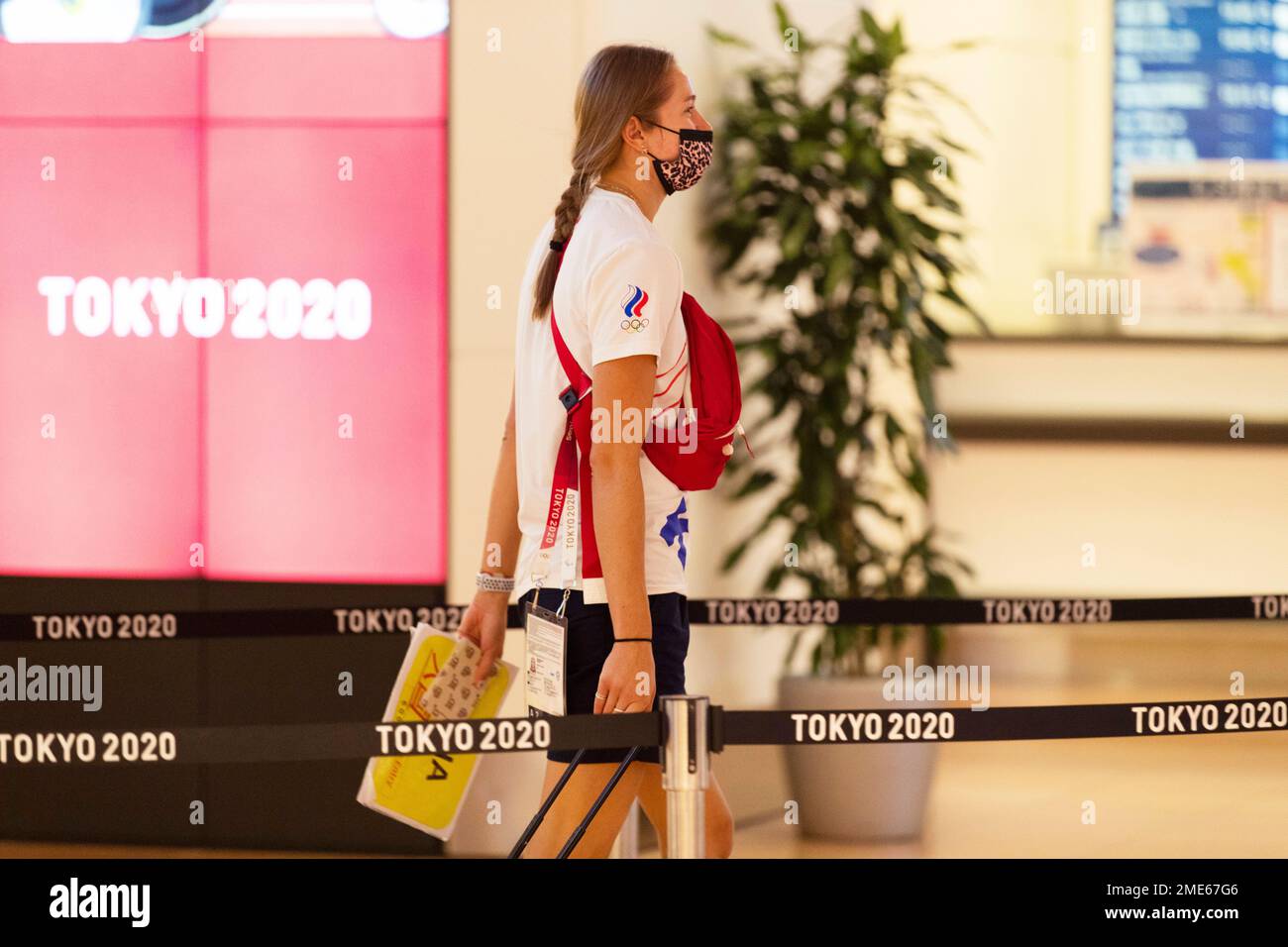 A Russian athlete arrives for the Tokyo 2020 Summer Olympic and ...