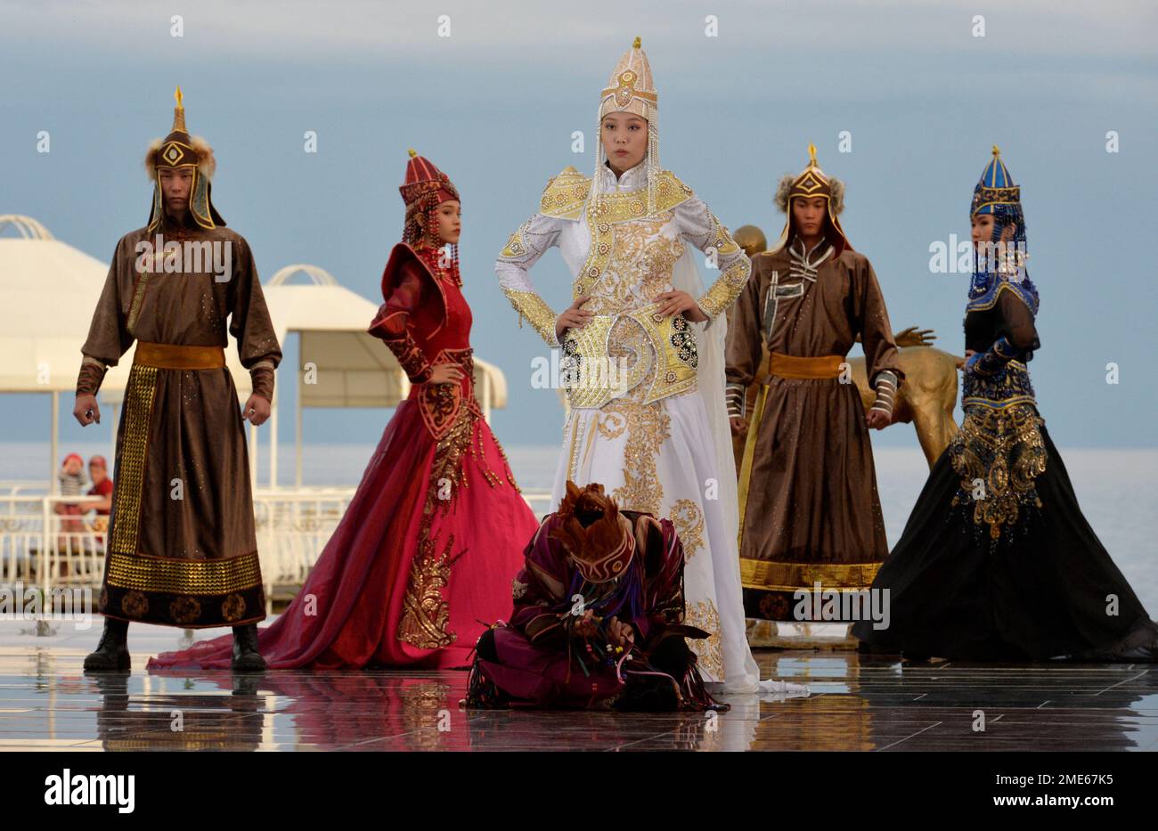 Models display the collection by Russian designer Kima Dongak during ...