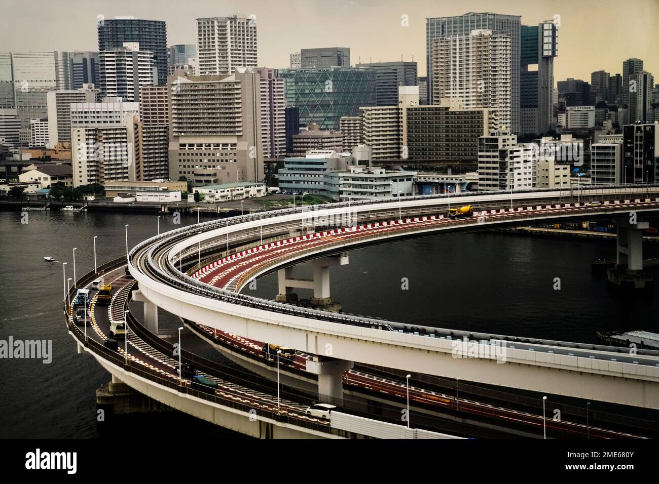 Motorists drive along a spiral ramp onto the Rainbow Bridge, Tuesday ...