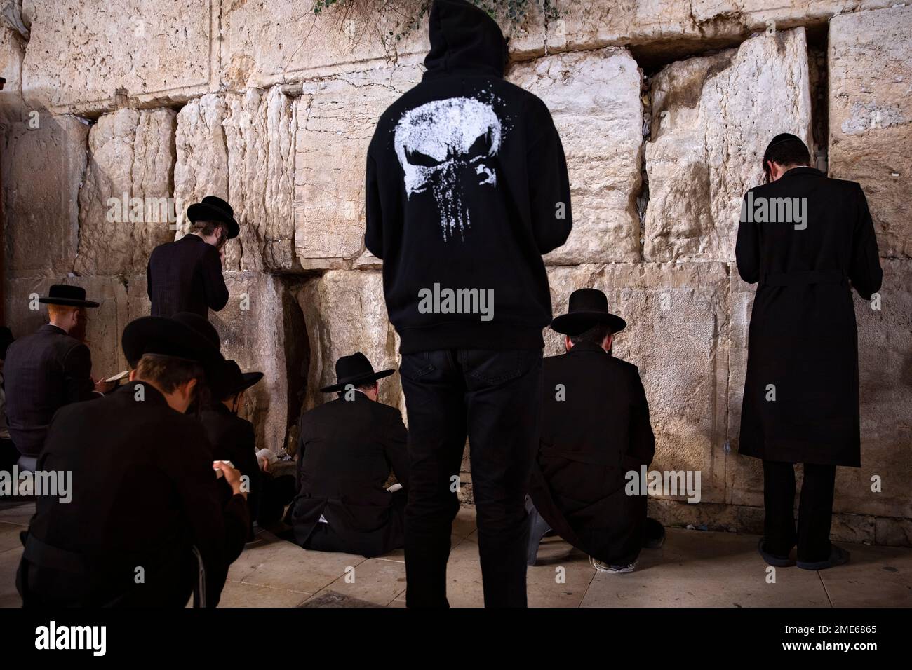 Ultra-Orthodox Jewish men pray during mourning ritual of Tisha B'Av ...