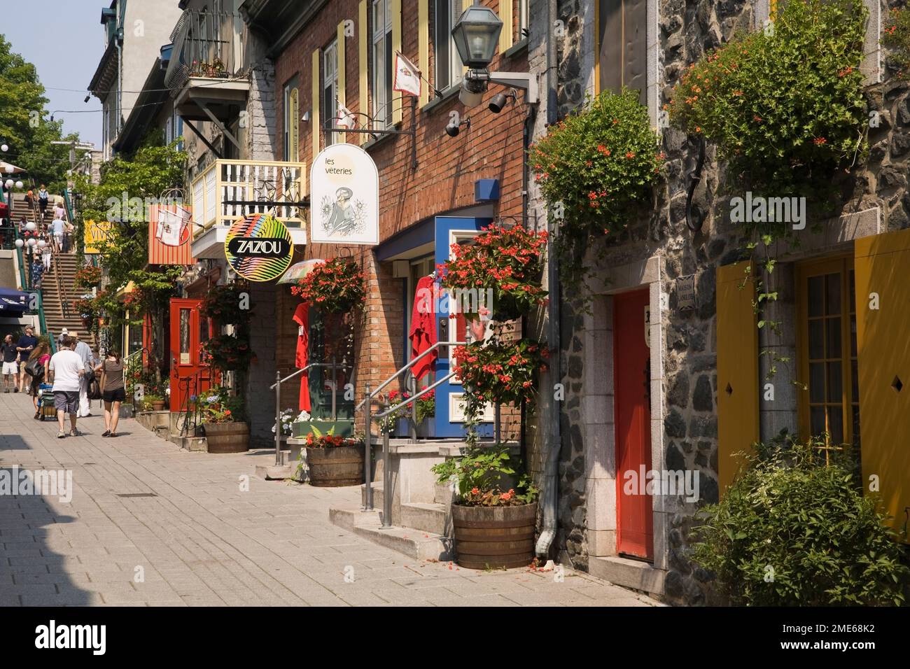 Shopping boutiques and tourists strolling along Rue du Petit-Champlain ...