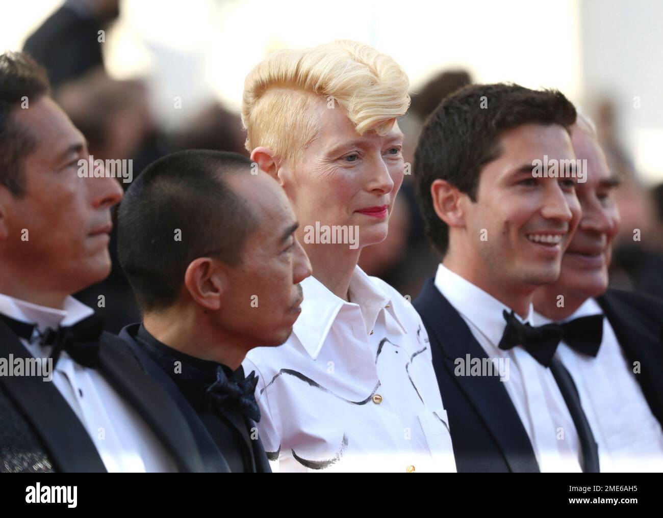 Tilda Swinton, center, poses for photographers upon arrival at the ...