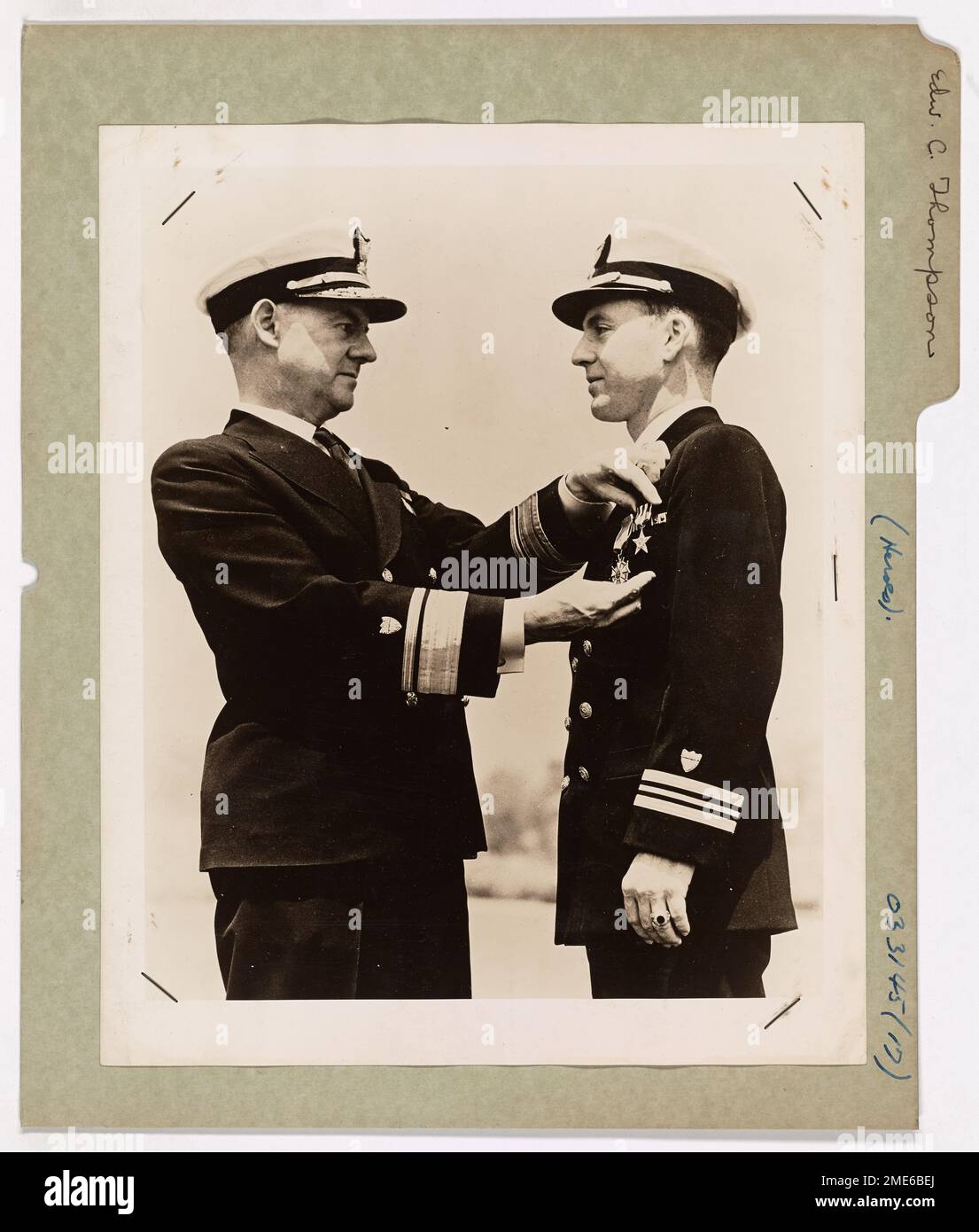 Lieutenant Commander Edward C. Thompson, Jr. is awarded the Legion of ...