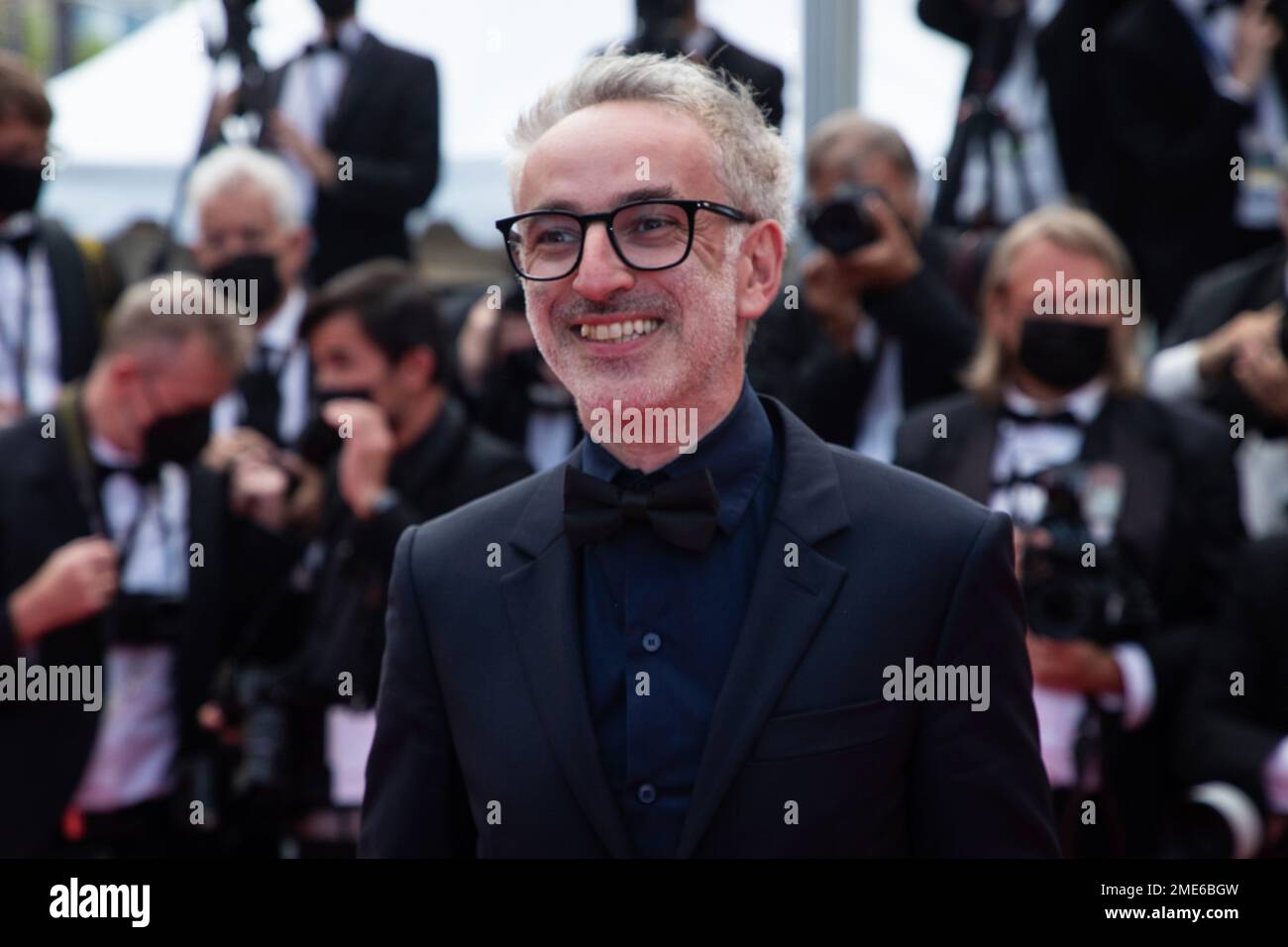 Vincent Delerm poses for photographers upon arrival at the premiere of ...