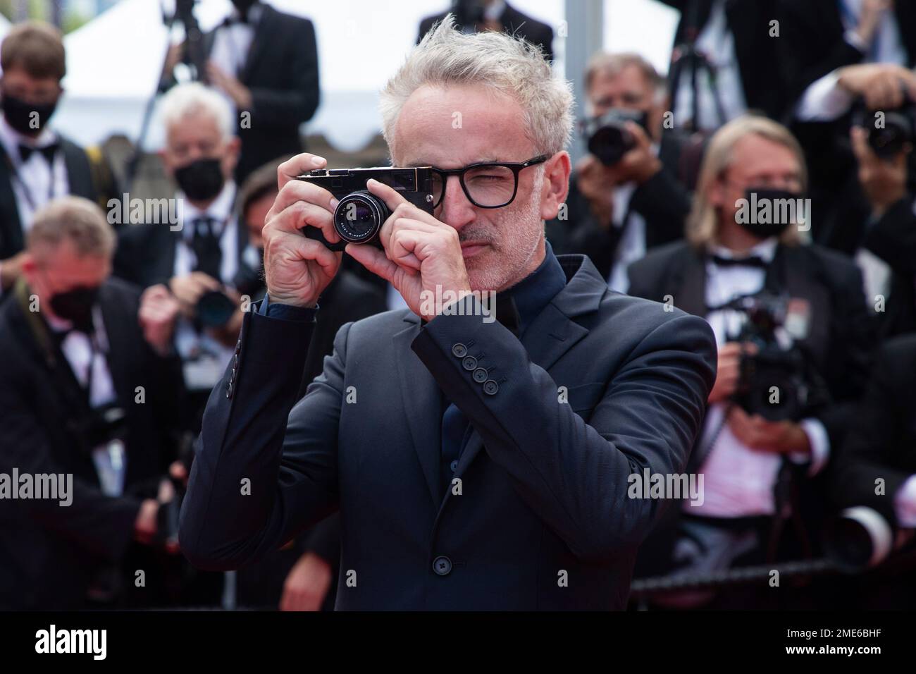 Vincent Delerm poses for photographers upon arrival at the premiere of ...
