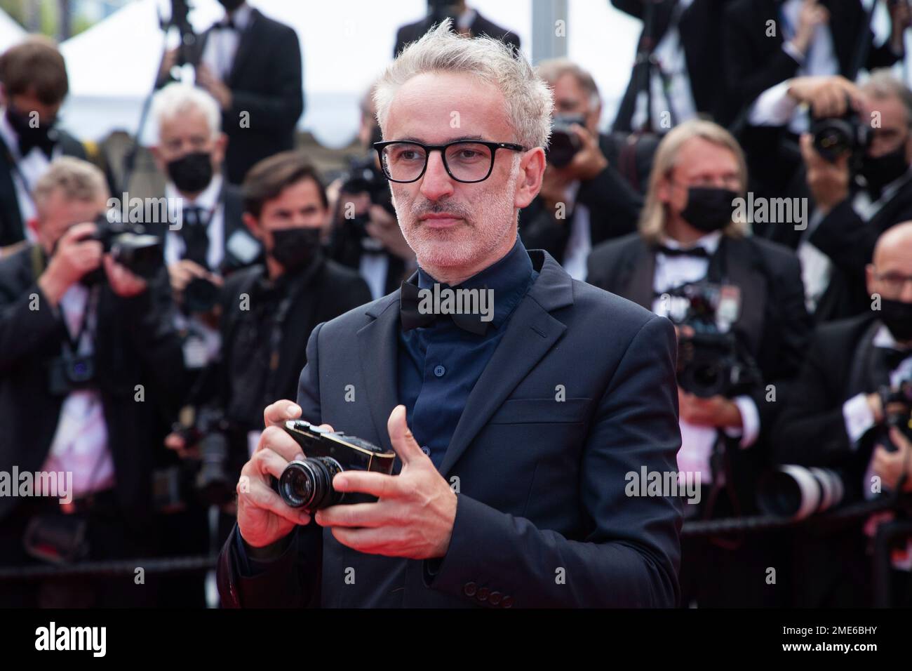 Vincent Delerm poses for photographers upon arrival at the premiere of ...