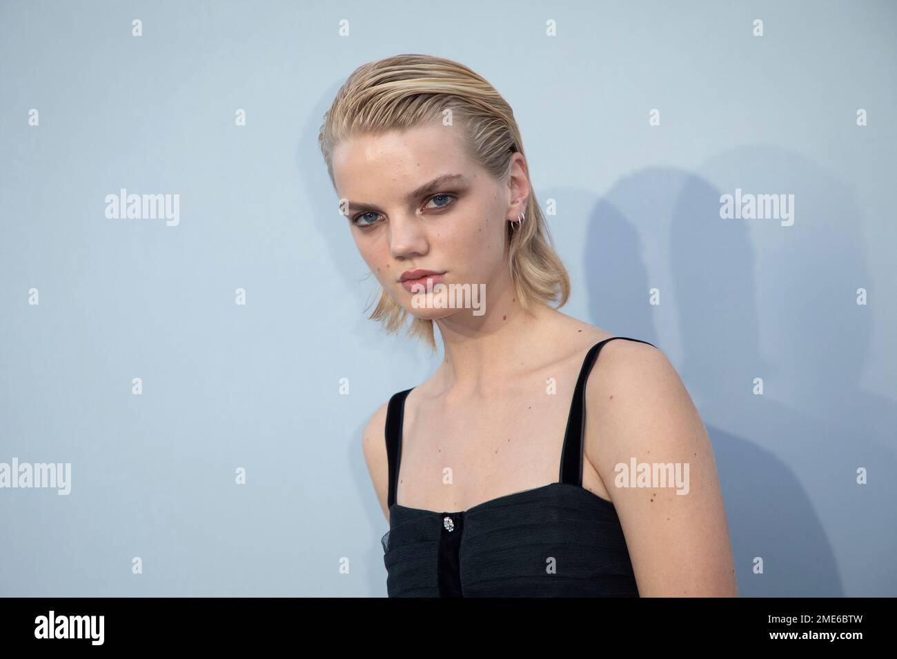 Evie Harris poses for photographers upon arrival at the amfAR Cinema ...