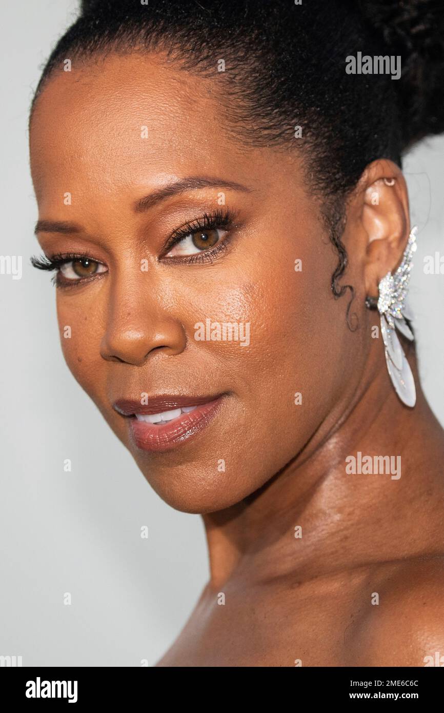 Regina King poses for photographers upon arrival at the amfAR Cinema ...