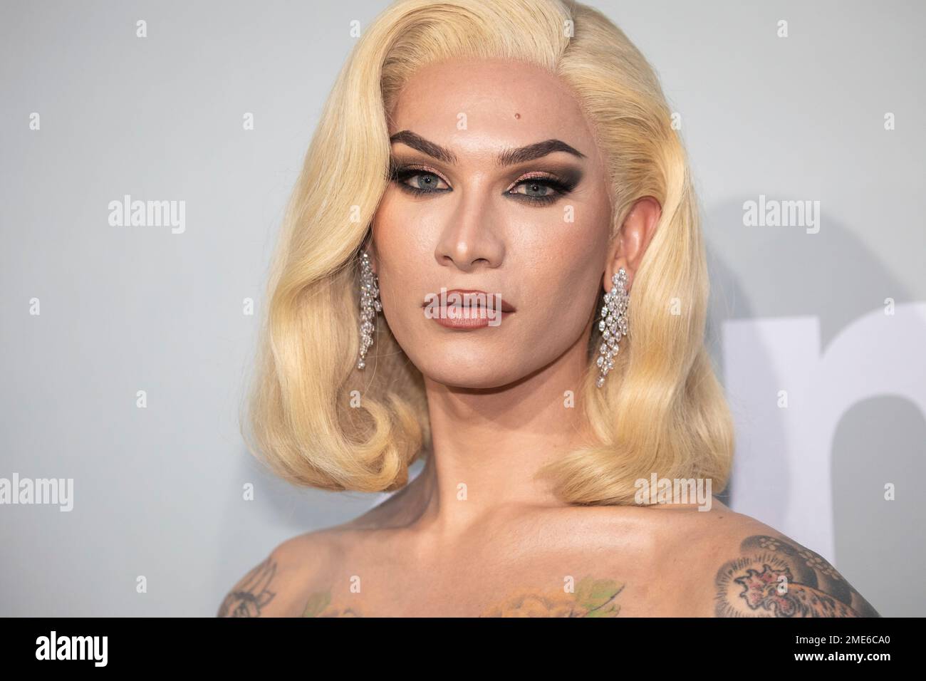 Miss Fame Poses For Photographers Upon Arrival At The Amfar Cinema Against Aids Benefit The