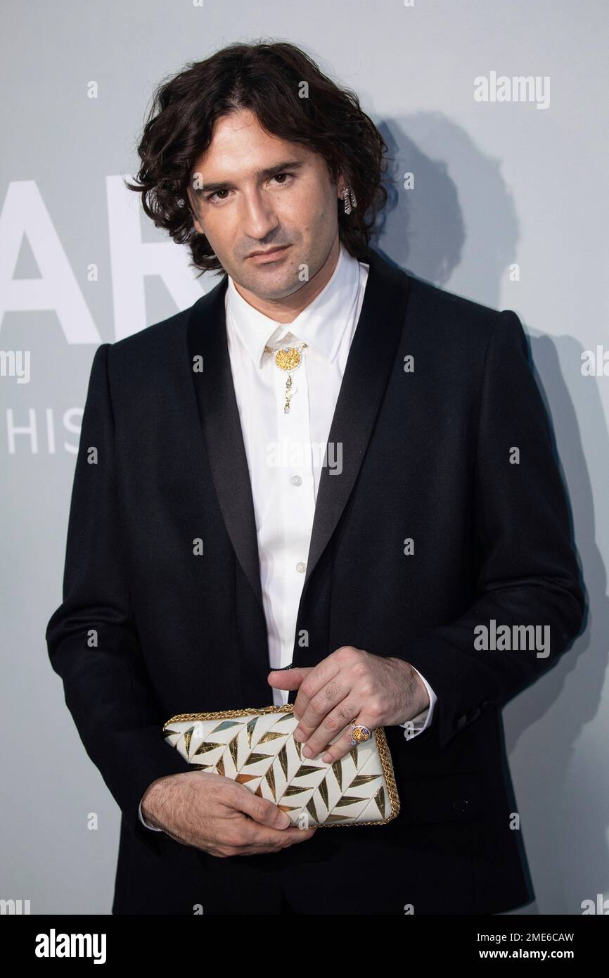 Nicolas Maury poses for photographers upon arrival at the amfAR Cinema ...