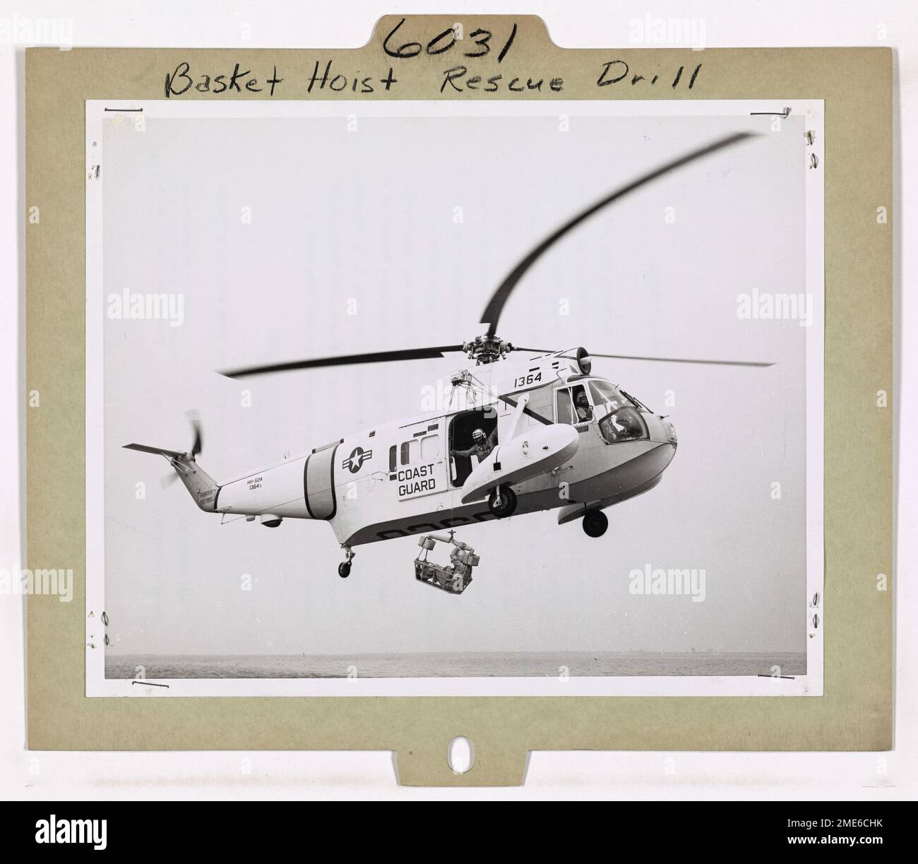 A gas turbine-powered flying boat helicopter demonstrates a basket ...