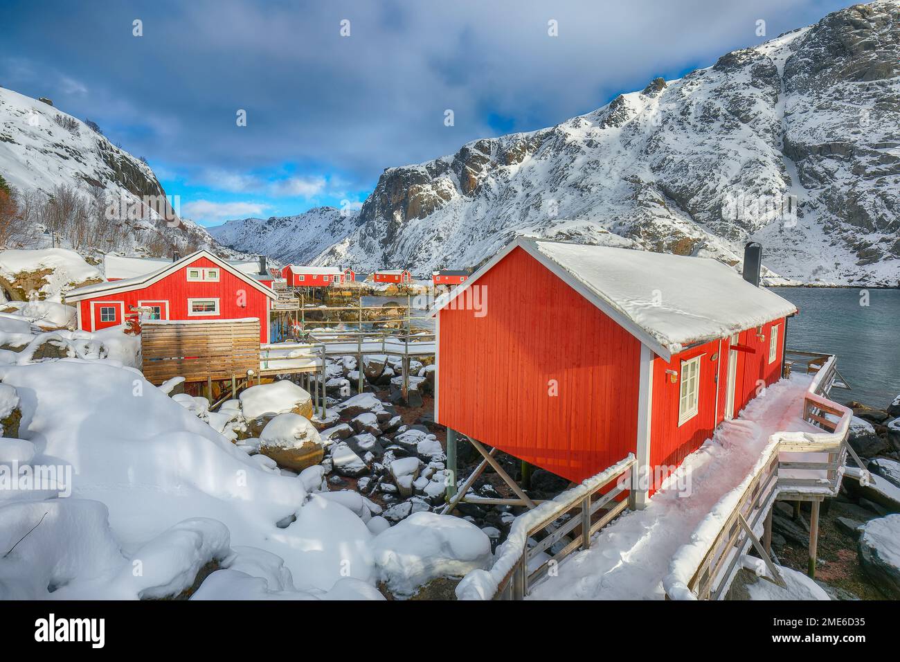 Amazing morning seascape of Norwegian sea and cityscape of Nusfjord ...