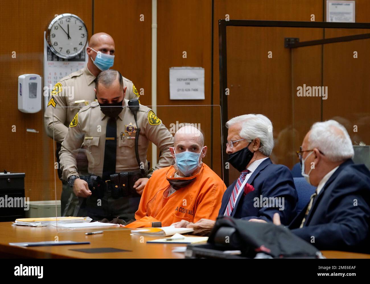 Michael Thomas Gargiulo, left, listens to his defense attorneys Daniel ...